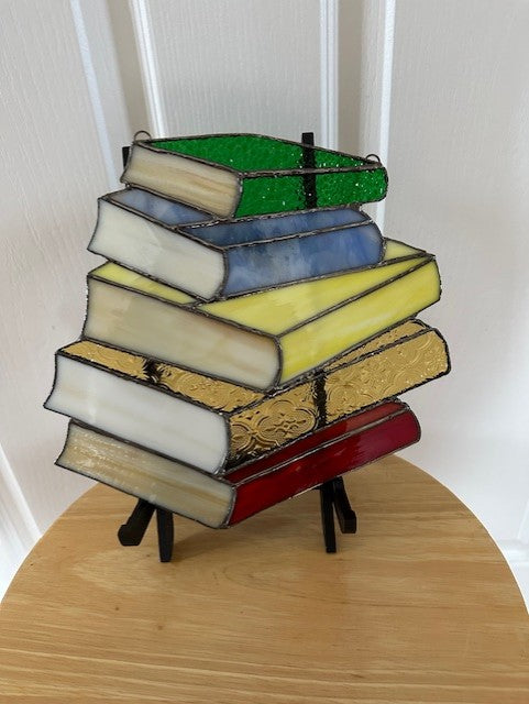 Stack of Books – The Vault Cultural Collective